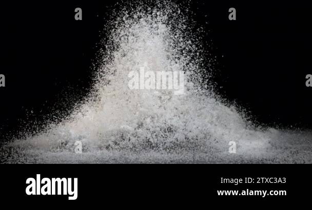 Coconut, cocos nucifera, Powder Exploding against Black Background ...