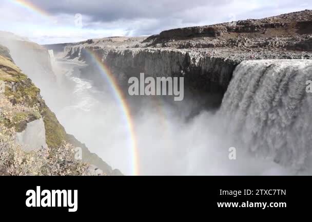 The famous Dettifoss waterfall. Beautiful waterfall with a bright ...