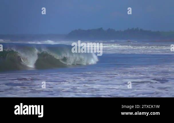 SLOW MOTION CLOSE UP: Big barrel wave crashing on shallow sandbars in ...