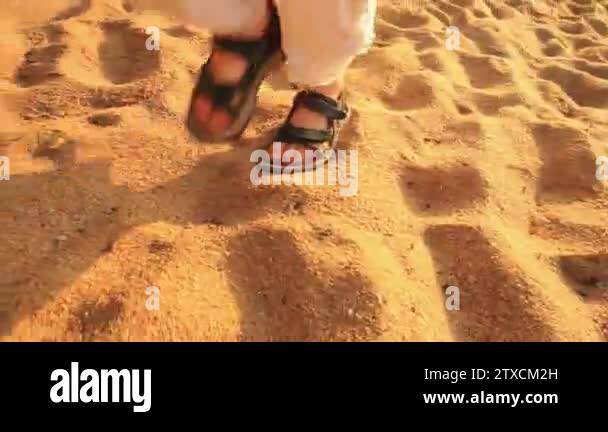 Man walking on sand Stock Videos & Footage - HD and 4K Video Clips - Alamy