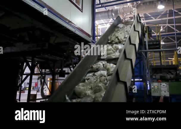 moving conveyor transporter on Modern waste recycling processing plant ...