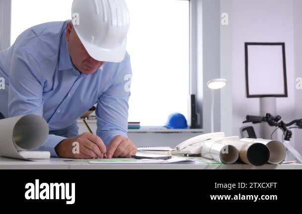 Busy Engineer in Office Room Write Using Pencil and Make Calculations ...