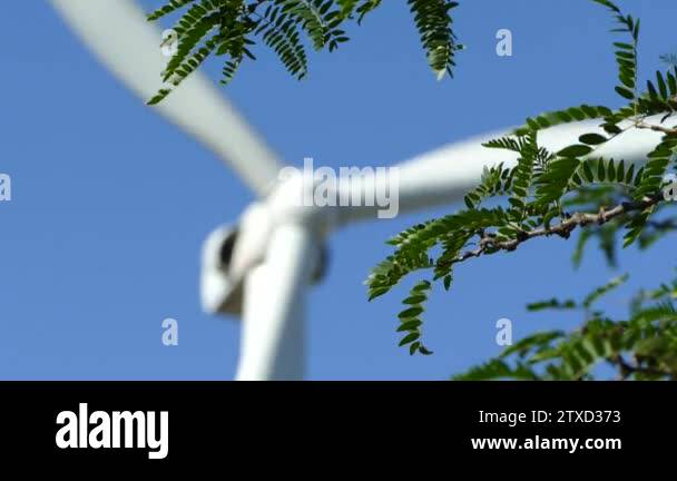 Wind power station. Wind turbine in operation. Green alternative energy ...