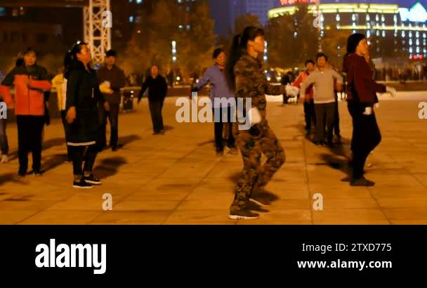 Chinese old people synchronized dancing at night outdoors for chinese ...