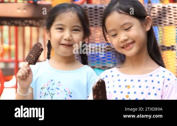 Kids sharing ice cream Stock Videos & Footage - HD and 4K Video Clips ...