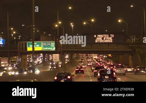 FPV: Driving slowly in a line of cars stuck in traffic jam on multiple lane highway, Chicago ...