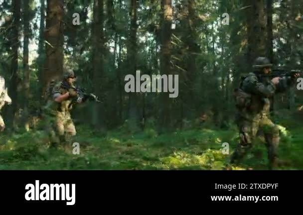 Fully Equipped Soldiers Wearing Camouflage Uniform Attacking Enemy ...
