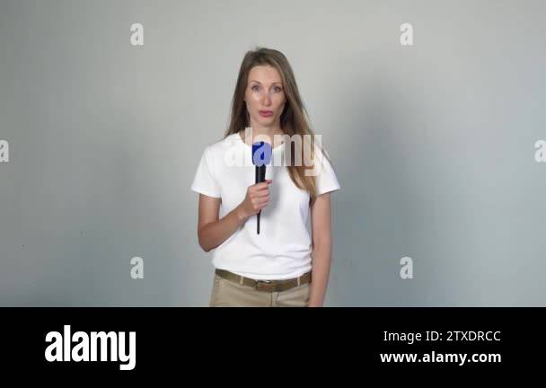 Woman talking into microphone Stock Videos & Footage - HD and 4K Video ...