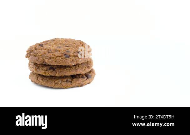 Half frame of a three soft and chewy chocolate chip oatmeal cookies ...