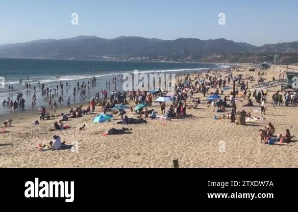 Crowd beach people Stock Videos & Footage - HD and 4K Video Clips - Alamy