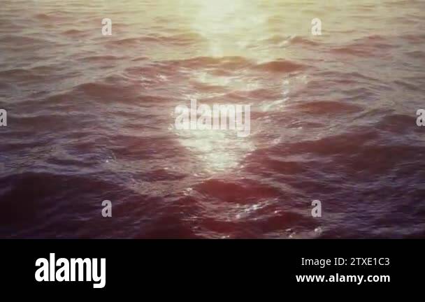 This stock motion graphics video shows a realistic ocean scene where ...