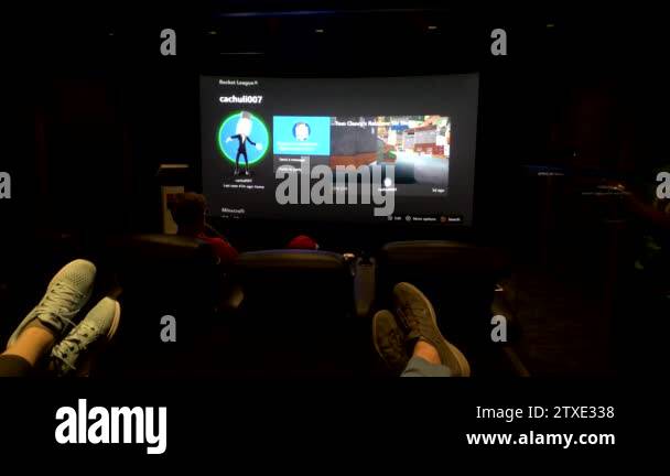 People watching demo movies in Microsoft store on 5th avenue in ...