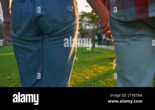 Couple holding hands back view summer Stock Videos & Footage - HD and ...