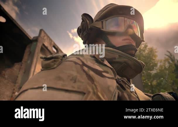 Calm soldier in helmet and camouflage is standing while sunlights ...
