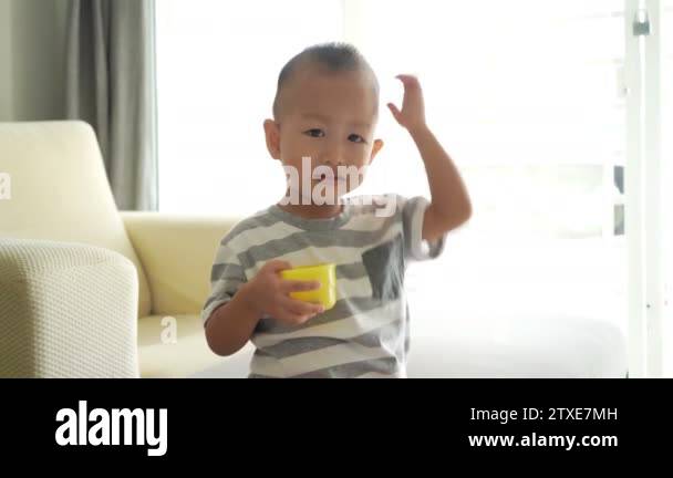 Itchy Boy Scratching. Two to three years old child scratches his head ...