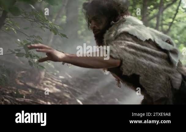 Primeval Caveman Wearing Animal Skin Holds Stone Tipped Spear Looks ...