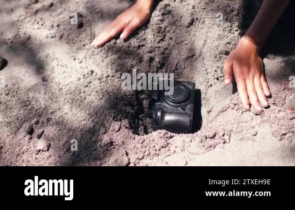 Burried in sand Stock Videos & Footage - HD and 4K Video Clips - Alamy