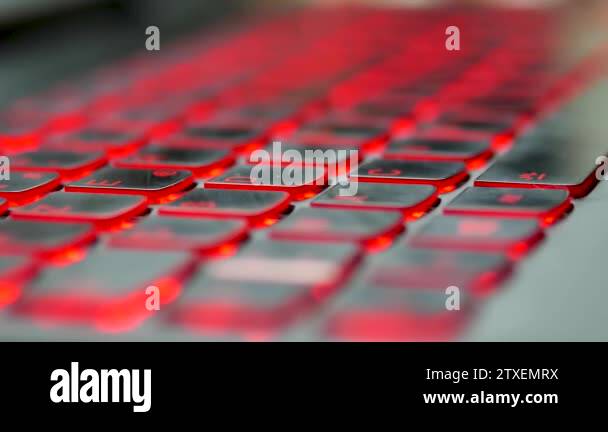 Close view of the keyboard of a laptop computer. The keyboard has keys ...