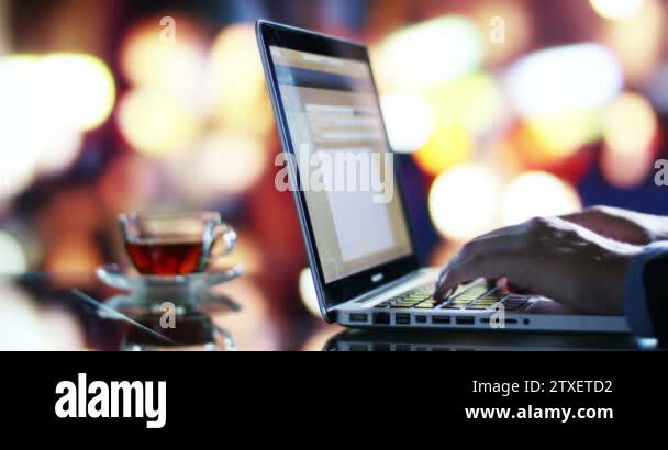hand typing and touch a screen LCD and interacts with applications and ...
