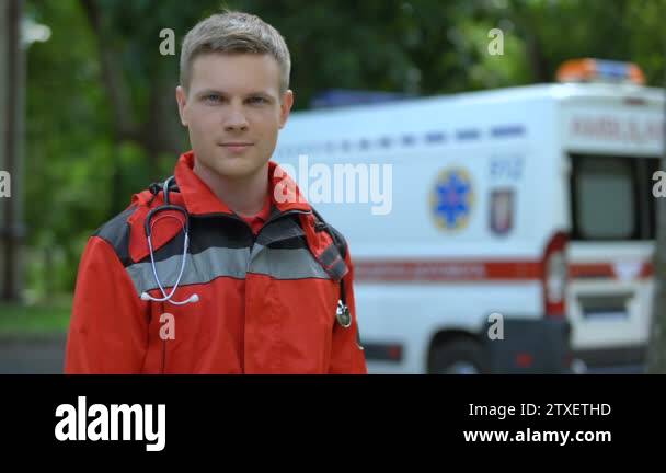 Male paramedic posing camera ambulance Stock Videos & Footage - HD and ...