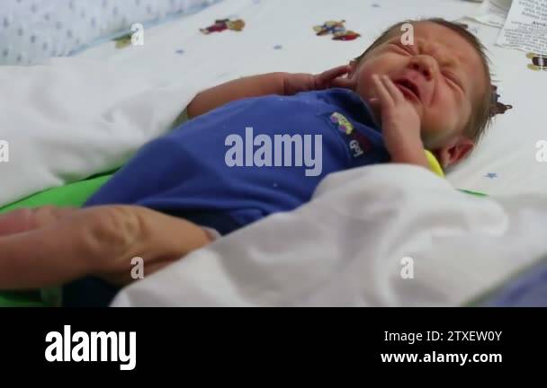 Newborn baby crying Stock Video Footage - Alamy