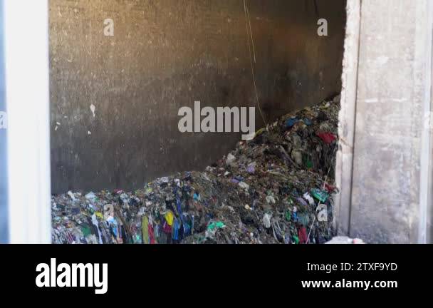 garbage pit in a garbage recycling plant, bottom view Stock Video ...