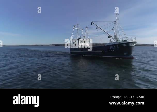 Drone Zooming Out from the Emblem of a Boat Revealing the Vast Ocean ...