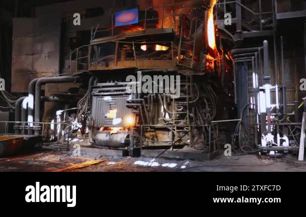 Steel production in a steelmaking furnace. Metallurgy. Casting ingot ...