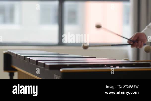 Man playing marimba. beautiful musician drumsticks movements. fast ...