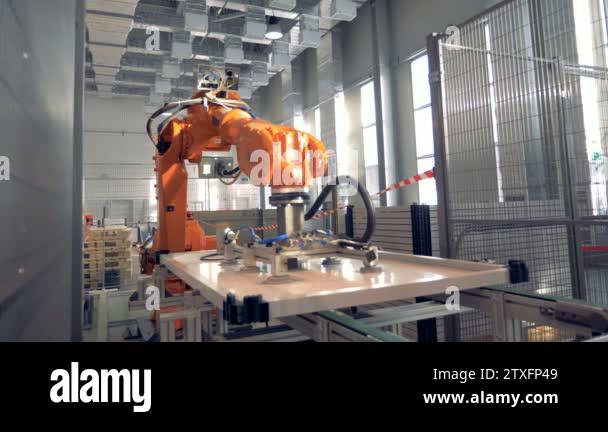 Modern factory robotic arm working at a plant. 4K Stock Video Footage ...
