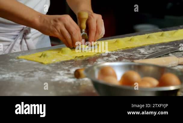 Attentive male baker using ravioli stamp in bakery shop 4k Stock Video ...