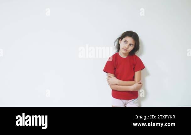 sad and depressed little girl standing by the wall. girl children sad ...