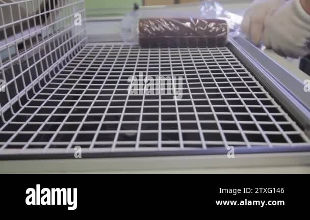 Process of thermo shrink wrapping of cylinder shaped object in ...