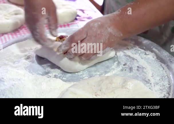 Coocing the traditional Georgian dish kubdari with meat, Svaneti Stock ...
