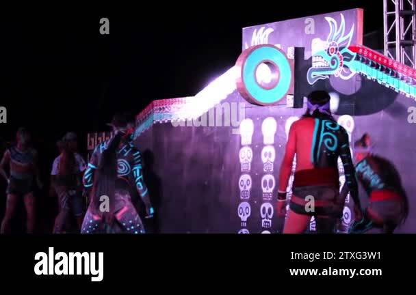 MEXICO CITY CIRCA OCTOBER 2018. Men wearing aztec clothes play the ball ...