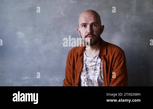 Bald man in shirt Stock Videos & Footage - HD and 4K Video Clips - Alamy
