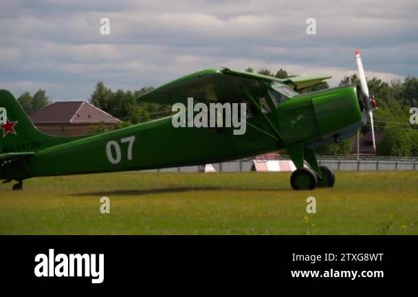 Yakovlev Yak-12 aircrafts on airfield Stock Video Footage - Alamy