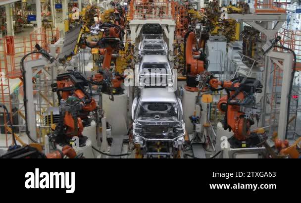body of car on conveyor top view. Modern Assembly of cars at the plant ...