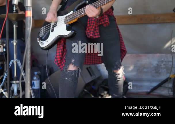 Guitars in live action at a concert. Concert rock band performing on ...