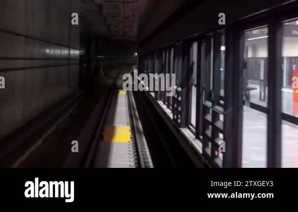 Driverless Train arriving at underground metro subway station platform ...