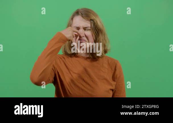 Woman Smelling Something Stinky Stock Video Footage - Alamy
