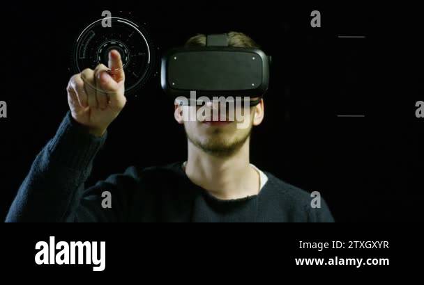 young nice man using 3d reality in life with oculus and augmented ...