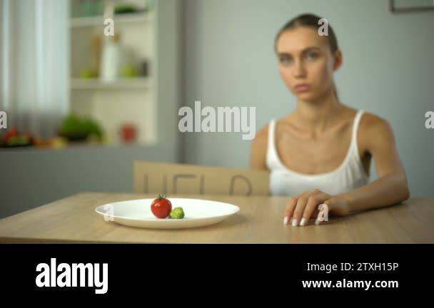 Help word written by depressed anorexic girl, starving body, eating ...