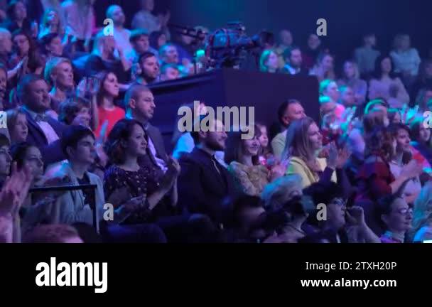 People viewers in a TV studio while recording a TV show Stock Video ...
