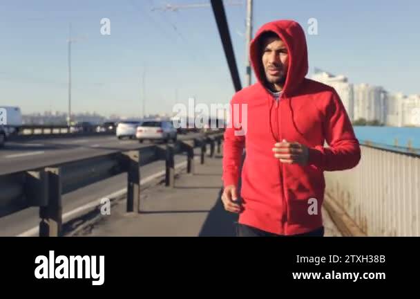 Running man in red Stock Videos & Footage - HD and 4K Video Clips - Alamy