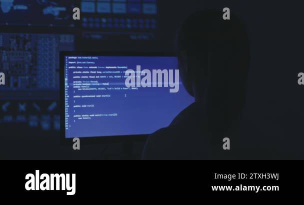 Experienced IT woman programmer works on a new program. Young woman ...