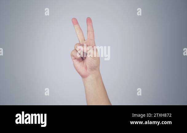 Asian man hand is counting the number from one to nine in asian style ...