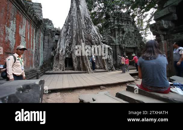 Angkor Ta Prom Wat , Cambodia - January 15, 2017: Tourists in one of ...