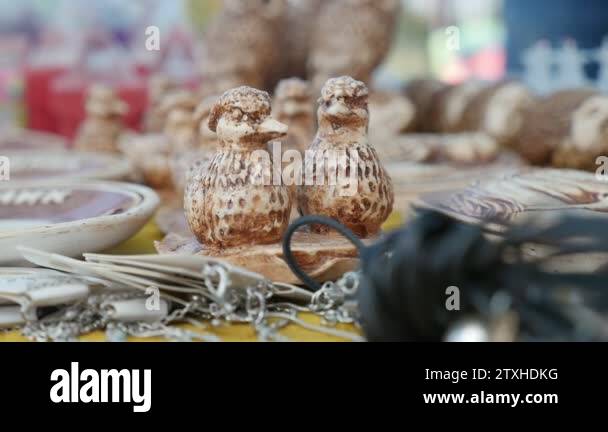 Funny folklore souvenirs depicting animals, people and pottery in ...