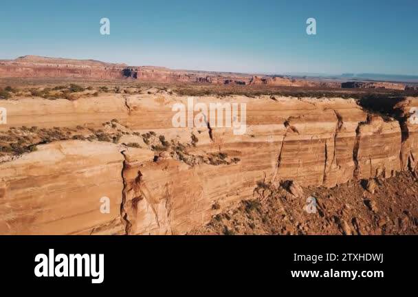 Drone panning left revealing amazing panorama of flat top mountain ...